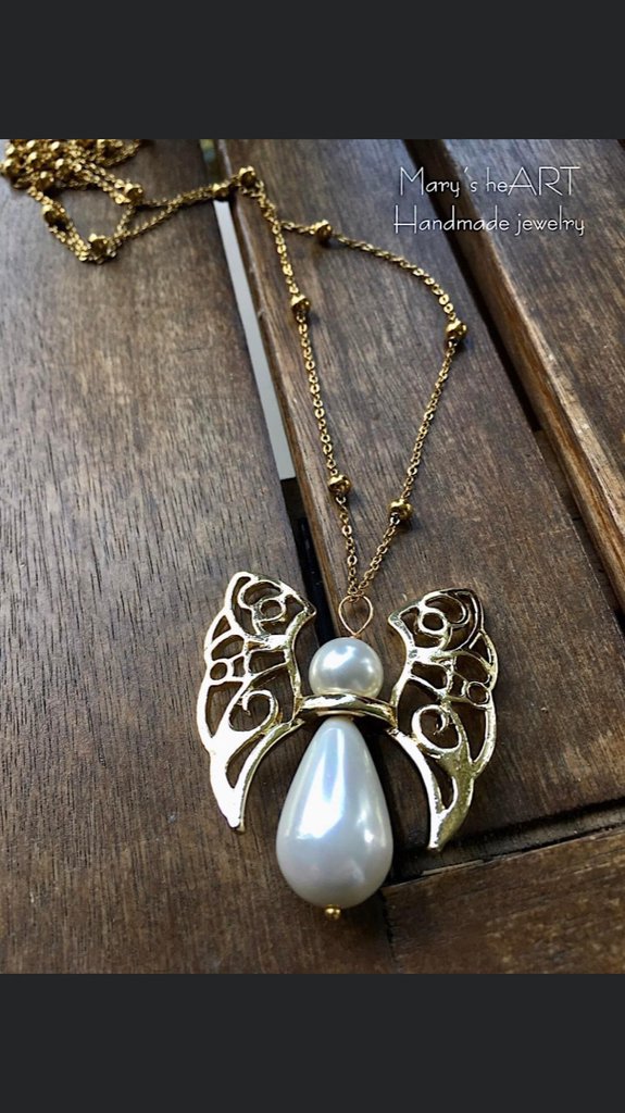 Collana ‘Angelo’ in acciaio dorato e madreperla - Gioielli - Colla ...