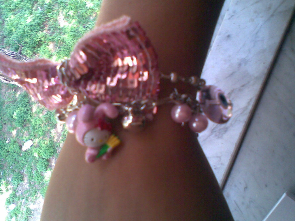 Bracciale HELLO KITTY con fiocco rosa - Gioielli - Bracciali e cavi ...