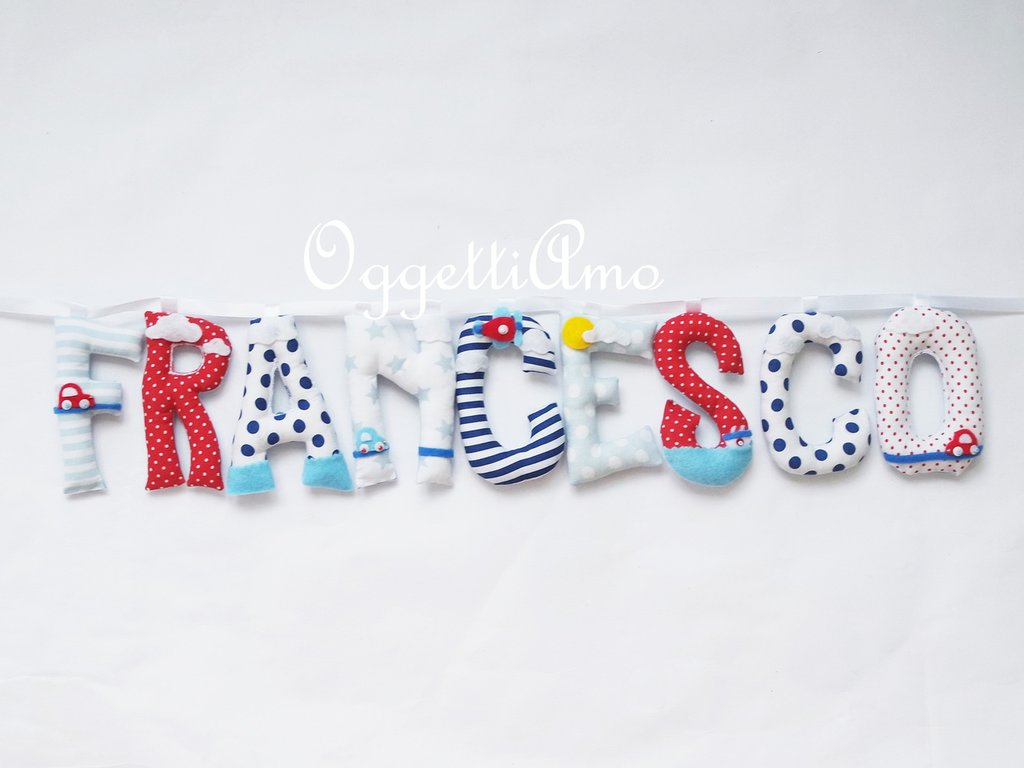 Francesco: una ghirlanda di lettere di stoffa imbottite decorate co ...
